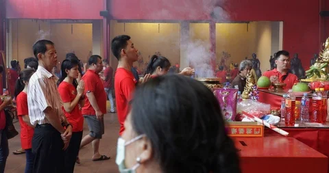 Buddhist people doing ritual in temple | Stock Video | Pond5