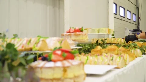 Buffet inside a warehouse filled with ca... | Stock Video | Pond5