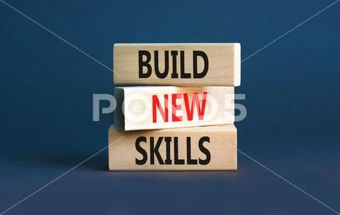 Photograph: Build new skills symbol. Concept word Build new skills on ...