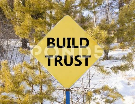 Build trust symbol. Concept words Build trust on beautiful yellow road ...