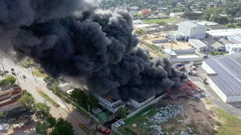 Building burning out of control with thi... | Stock Video | Pond5