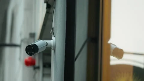 Building-mounted CCTV camera for enhance... | Stock Video | Pond5