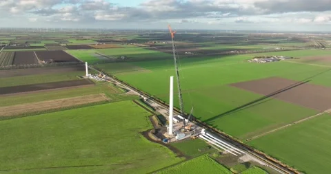 Building process of wind turbine windmil... | Stock Video | Pond5