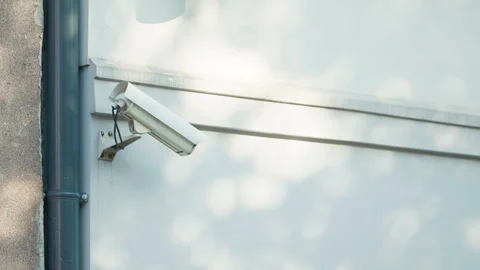 Building Wall-Mounted CCTV Camera in an ... | Stock Video | Pond5