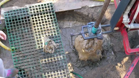 Building a well in the house courtyard, ... | Stock Video | Pond5