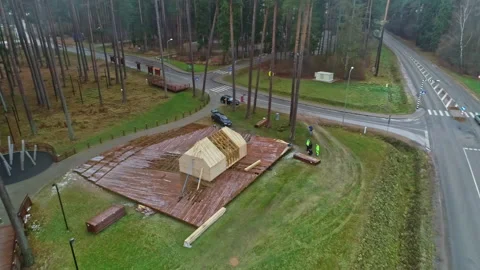 building a wooden house in a forest. Aer... | Stock Video | Pond5