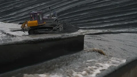 Bulldozer Moves Earth Through Water Flow... | Stock Video | Pond5