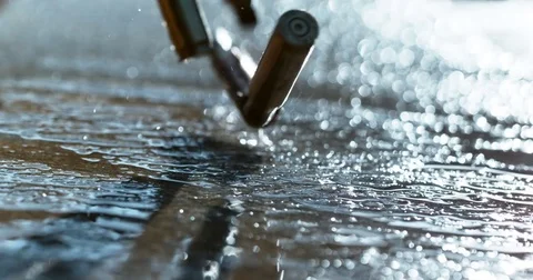 Bullet casings falling to the floor in s... | Stock Video | Pond5