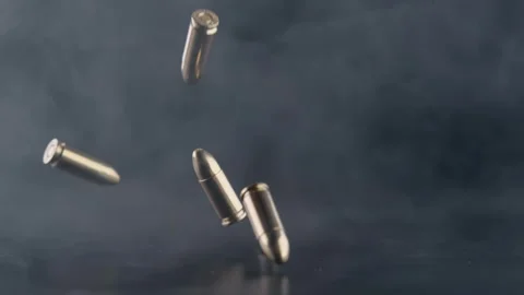 Bullets Falling onto Counter in a Smoke-... | Stock Video | Pond5