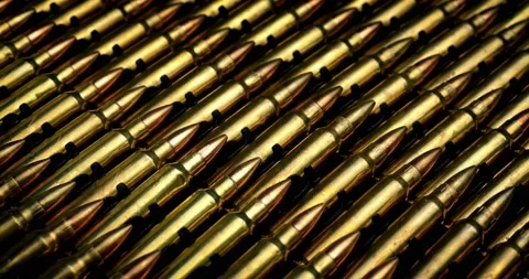 bullets lined isolated. 4k rifle ammo on... | Stock Video | Pond5
