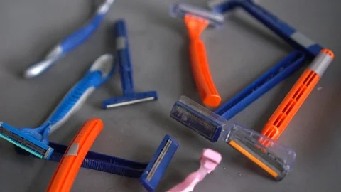 Bunch of old disposable razors. The prob... | Stock Video | Pond5
