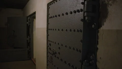 Bunker door. Thick, riveted steel door w... | Stock Video | Pond5