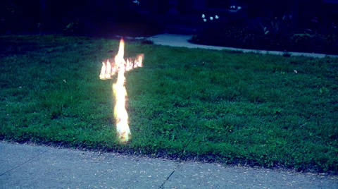 burning cross in yard | Stock Video | Pond5