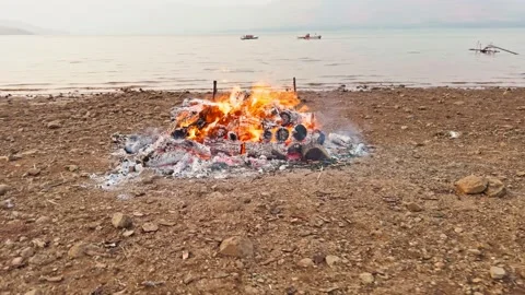 burning dead body in hindu cremation fun... | Stock Video | Pond5