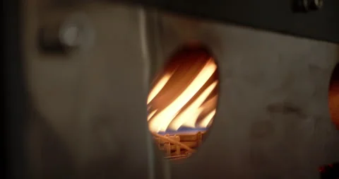 Burning fire in a gas coffee roaster. Pa... | Stock Video | Pond5
