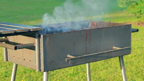 Burning Fire with Smoke Inside a Brazier | Stock Video | Pond5