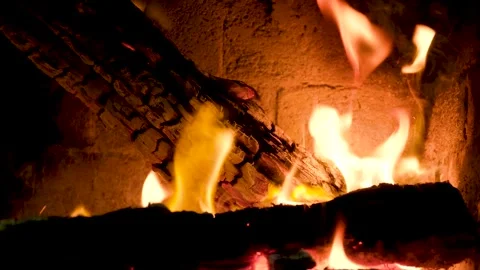 Burning firewood in fire-box of fireplac... | Stock Video | Pond5