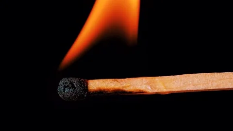 A burning match with a large flame. A ma... | Stock Video | Pond5