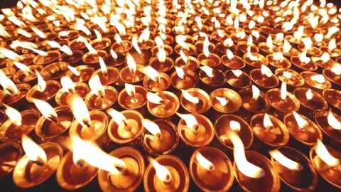 Burning ritual candles in nepali temple.... | Stock Video | Pond5
