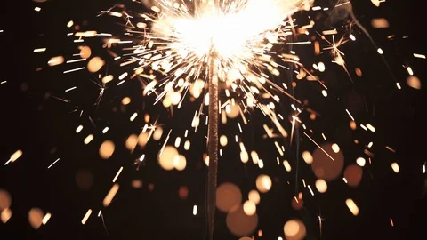 Burning sparkler bengal fire on black ba... | Stock Video | Pond5