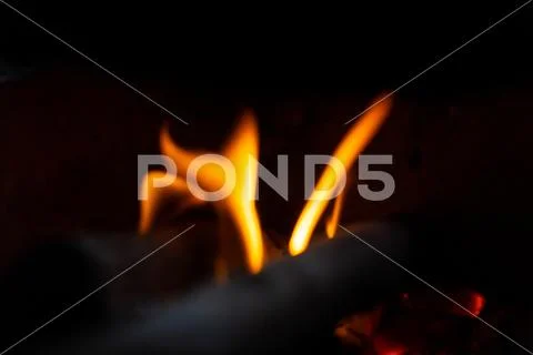 Burning wood branch texture for warm and atmospheric backgrounds in ...