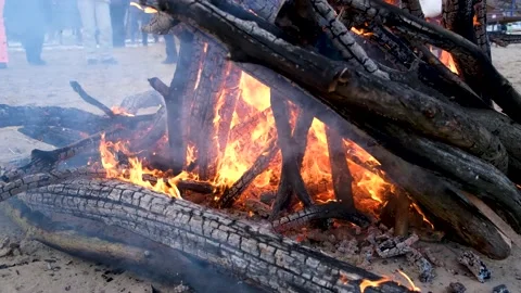 Fanning The Flames Stock Footage ~ Royalty Free Stock Videos | Pond5