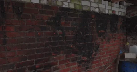 A burnt brick wall with soot stains from... | Stock Video | Pond5