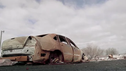 Burnt Car Left to Rust in Junkyard due t... | Stock Video | Pond5