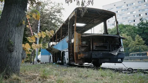 Bus after the fire. Explosion of a bomb ... | Stock Video | Pond5