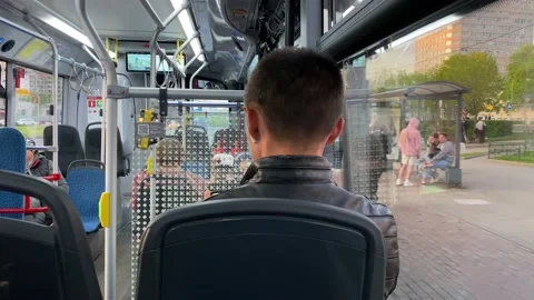 Bus leaving from bus stop near metro. Pa... | Stock Video | Pond5