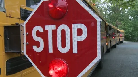Bus stop sign with hazard lights on. (1 ... | Stock Video | Pond5