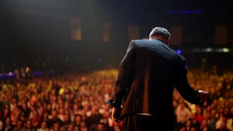 business coach speaking on stage, back v... | Stock Video | Pond5