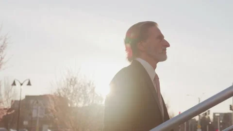 Business Guy Walking Up To Office Buildi... | Stock Video | Pond5