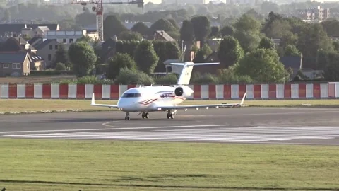 Business Jet Lining up onto the Runway f... | Stock Video | Pond5