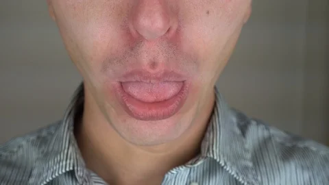 Blowing A Raspberry Stock Footage ~ Royalty Free Stock Videos | Pond5