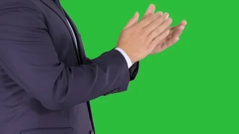 Business man clapping hands on a Green S... | Stock Video | Pond5