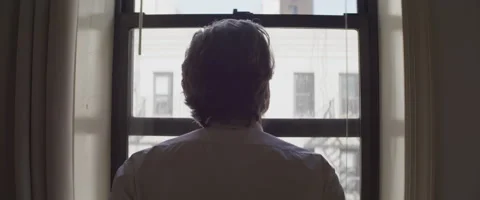 Business Man Stands Looking Out Window A... | Stock Video | Pond5