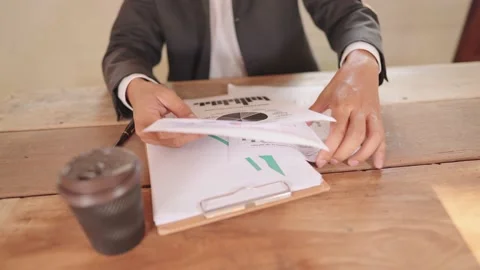 Business people review and sign document... | Stock Video | Pond5