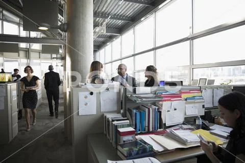 Business people talking, meeting at office cubicle ~ Hi Res #201780743