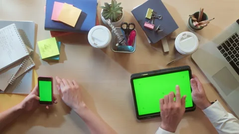 Business people using gadgets with chrom... | Stock Video | Pond5