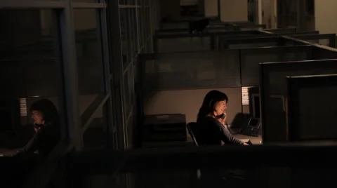 Business woman in a cubicle alone at her... | Stock Video | Pond5