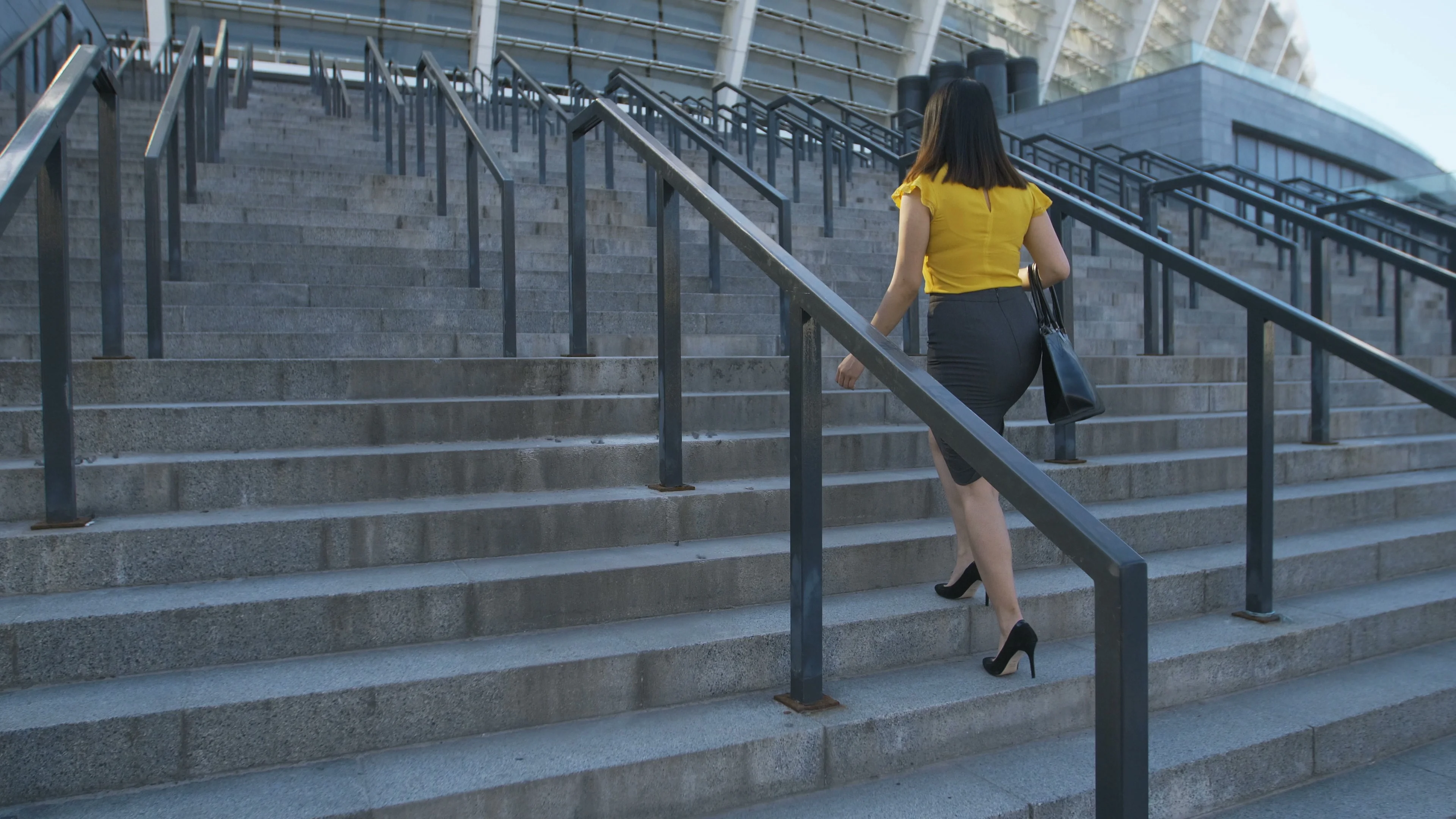 Business Woman Climbing Stairs