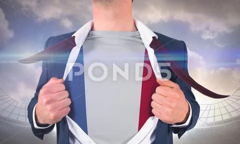 Businessman opening shirt to reveal france flag Stock Image #38066601