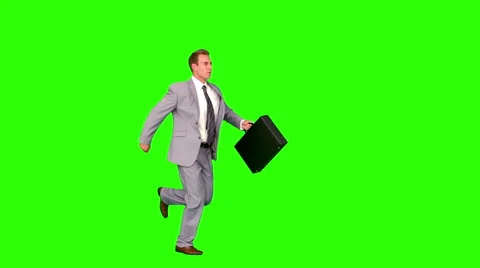 Businessman running on green screen | Stock Video | Pond5