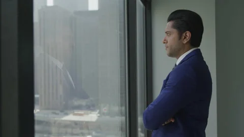 Businessman Staring Out Window | Stock Video | Pond5