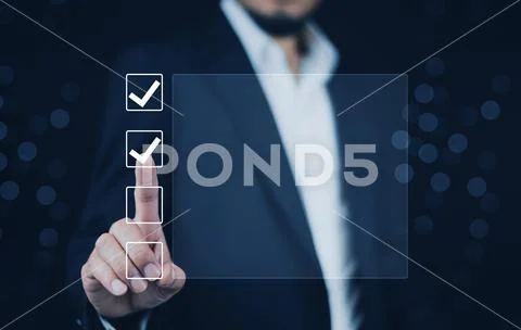 Businessman touch on digital screen check correct sign mark in checkbox ...