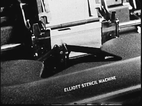 A businessman uses an Elliott Stencil ma... | Stock Video | Pond5