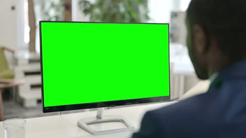 Businessman Using Desktop with Green Chr... | Stock Video | Pond5