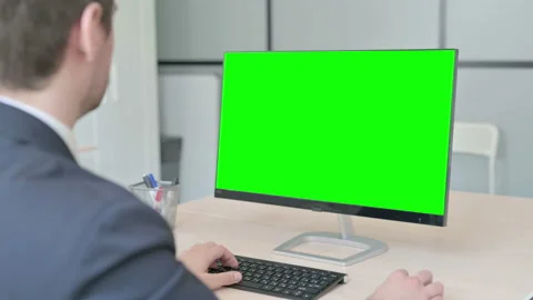 Businessman Using Desktop with Green Scr... | Stock Video | Pond5