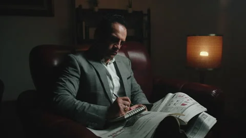 Businessman writing note and reading fro... | Stock Video | Pond5